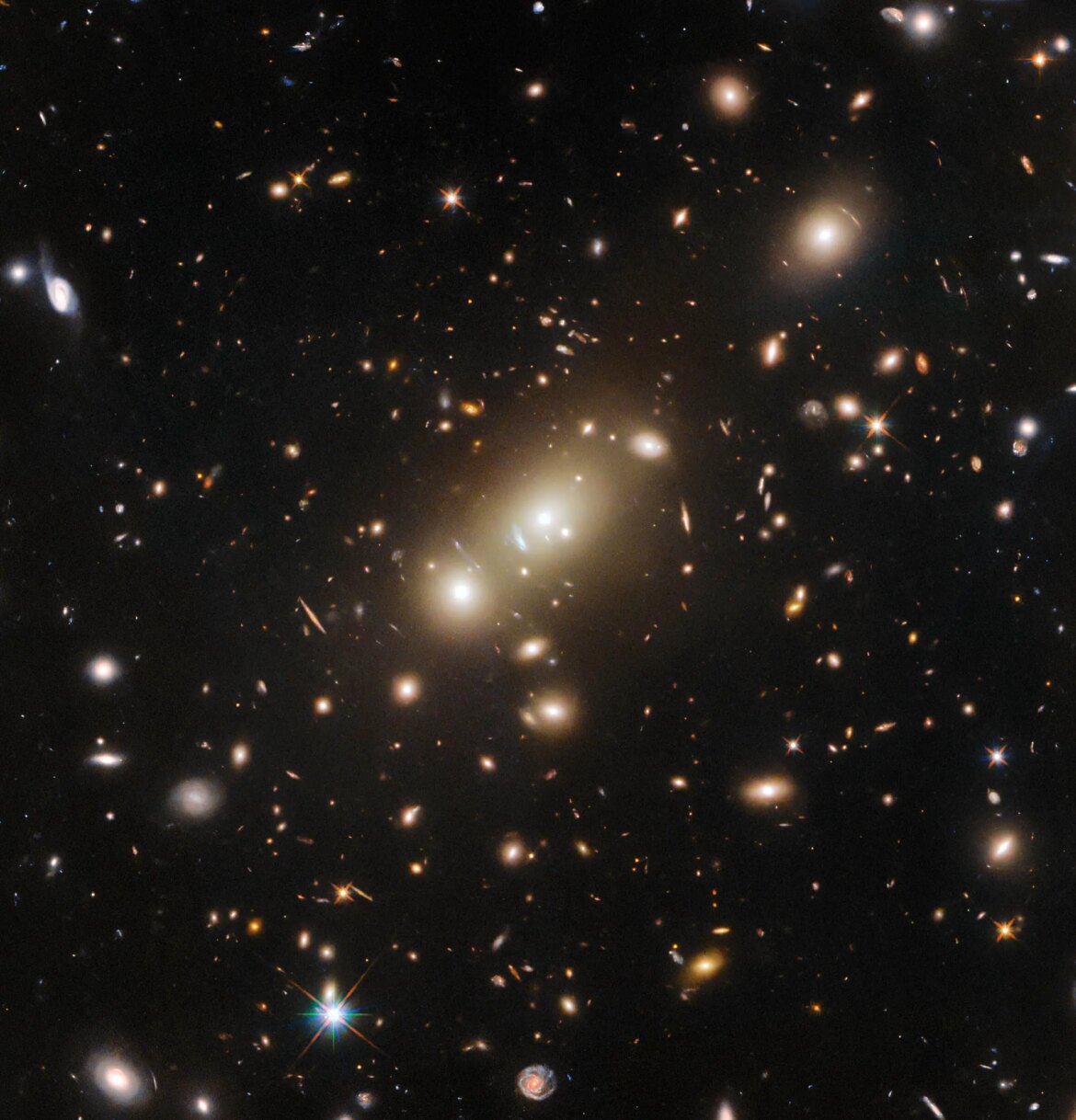 Hubble Space Telescope Image Reveals Enormous Galaxy Cluster - SciTechPost